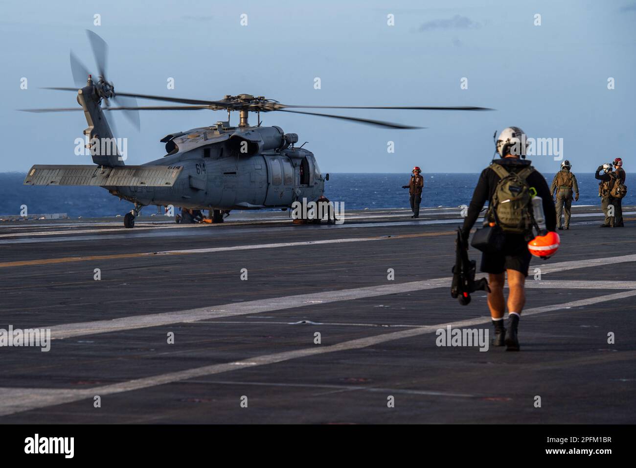 230316-N-WM182-3043 PHILIPPINE SEA (March 16, 2023) An MH-60S Sea Hawk ...
