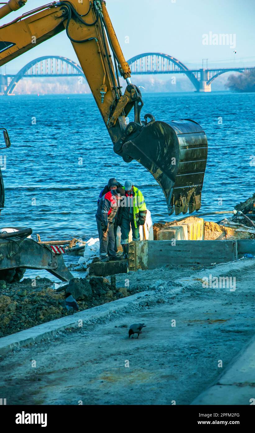 Dnepropetrovsk, Ukraine - 11.26.2021: Excavator works to strengthen the ...