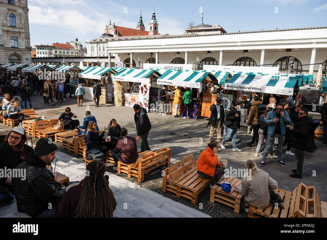 People seen at the traditional Open Kitchen food market as it opens for ...