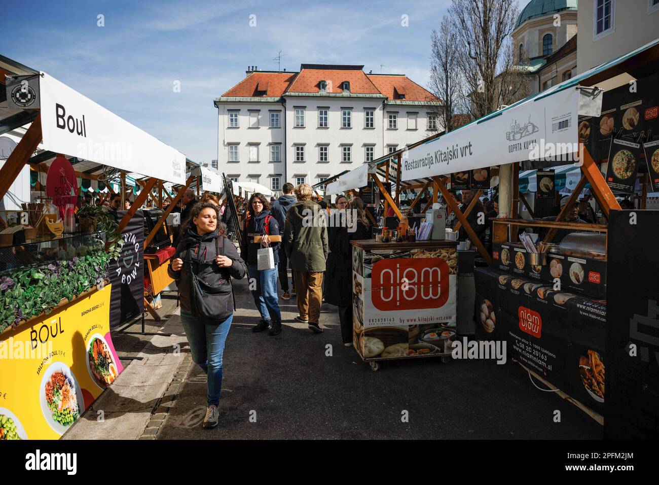 People seen at the traditional Open Kitchen food market as it opens for ...