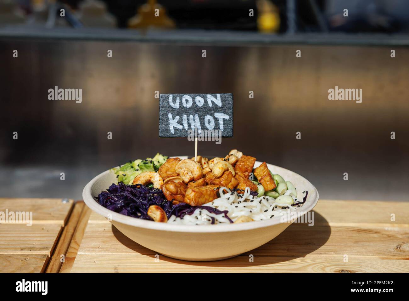 A dish sits on a counter of a food stall at the traditional Open ...