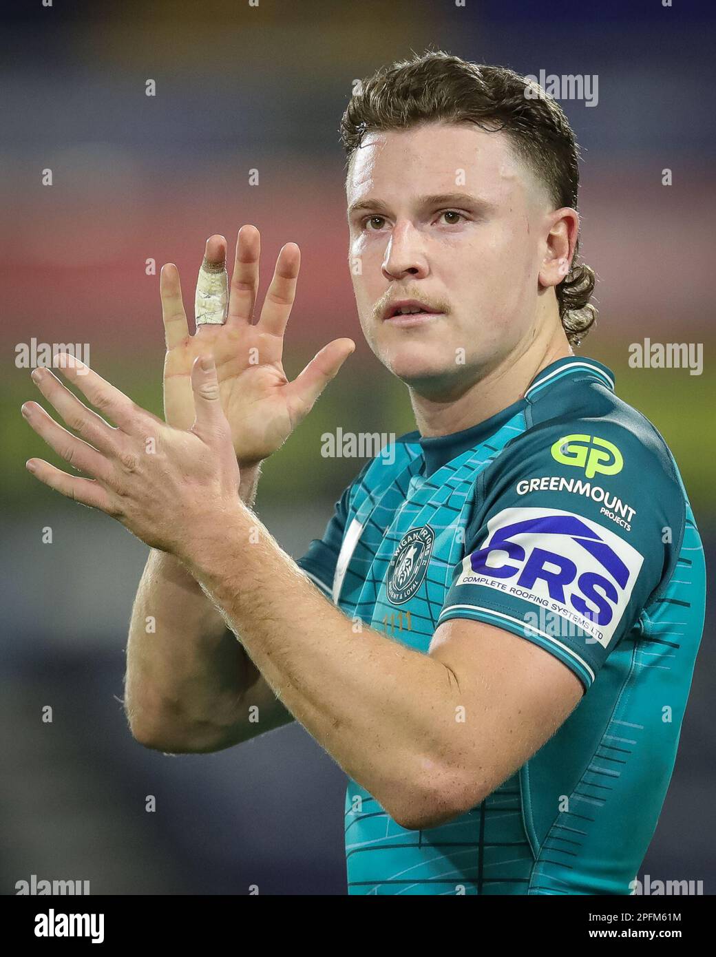 Huddersfield, UK. 17th Mar, 2023. Jai Field #1 of Wigan Warriors claps ...
