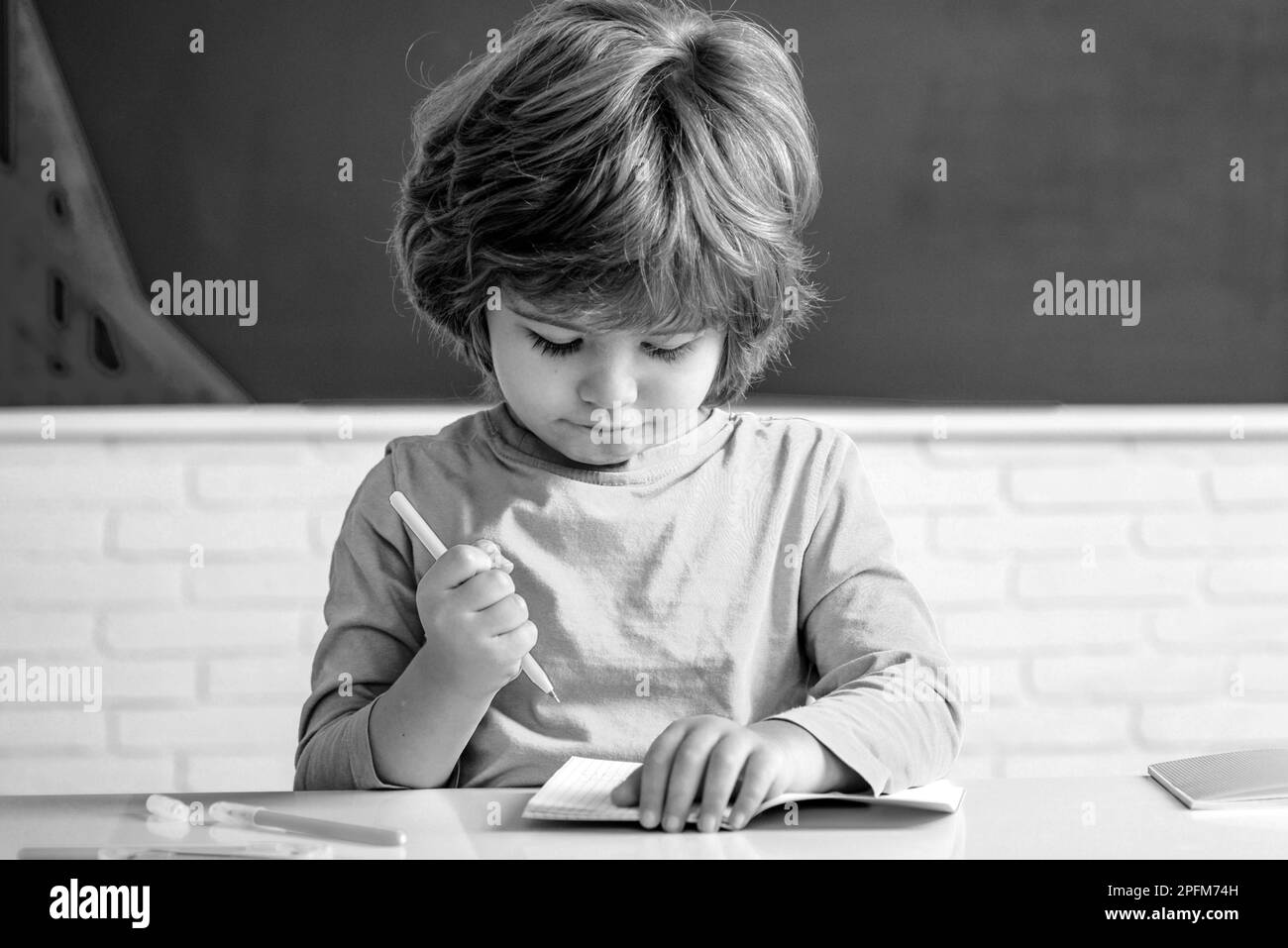 Back to school. School kids against green chalkboard. Individual ...