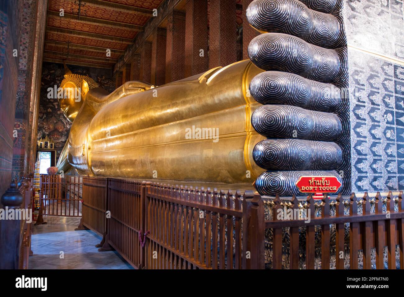 Gigantic Reclining Buddha statue in Wat Pho, Bangkok. Wat Pho is the oldest and largest temple ...
