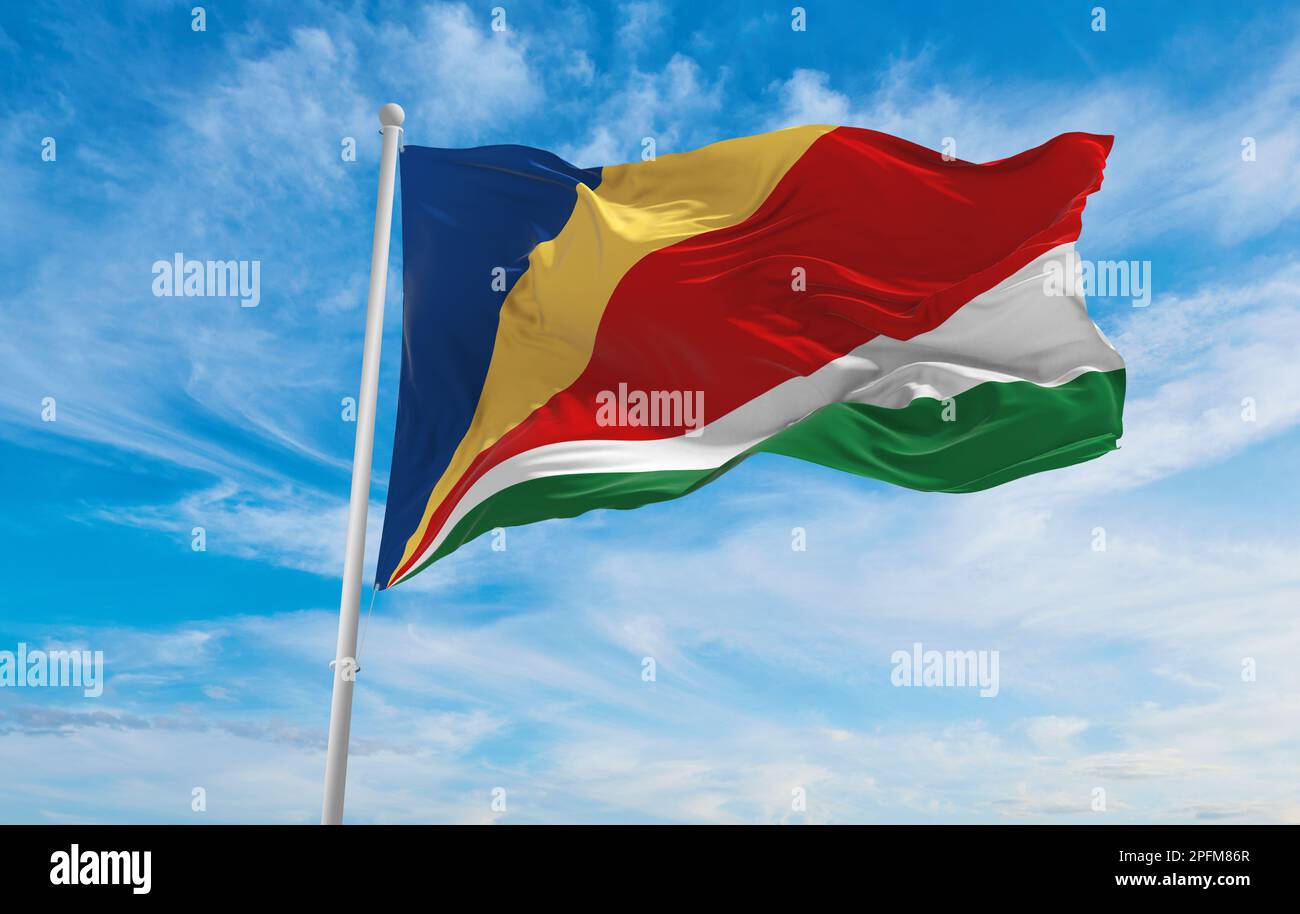 flag of French Creole peoples Seychellois people at cloudy sky ...