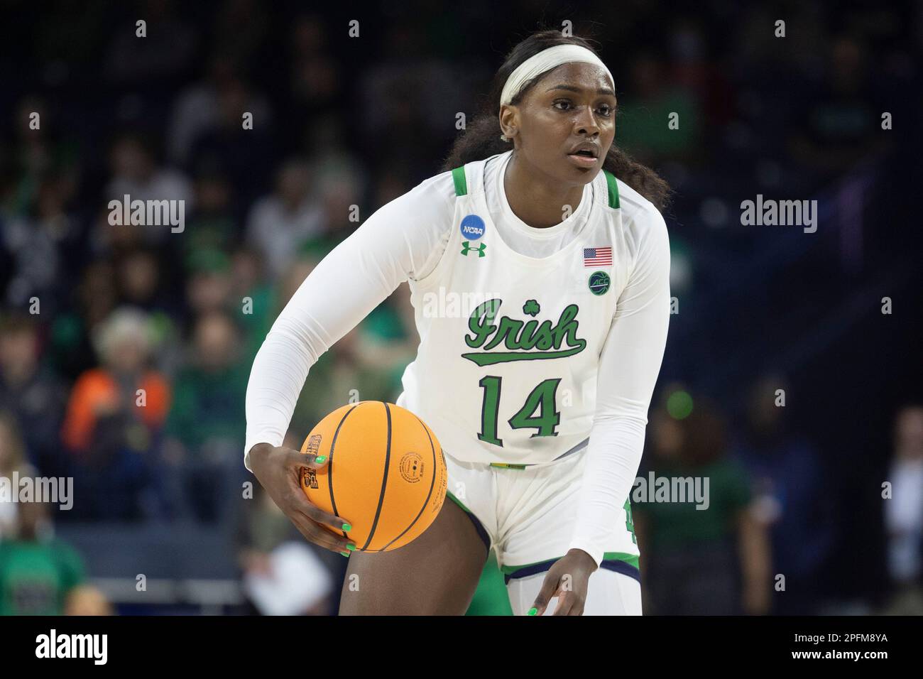South Bend, Indiana, USA. 17th Mar, 2023. Notre Dame guard KK Bransford (14) directs the offense ...