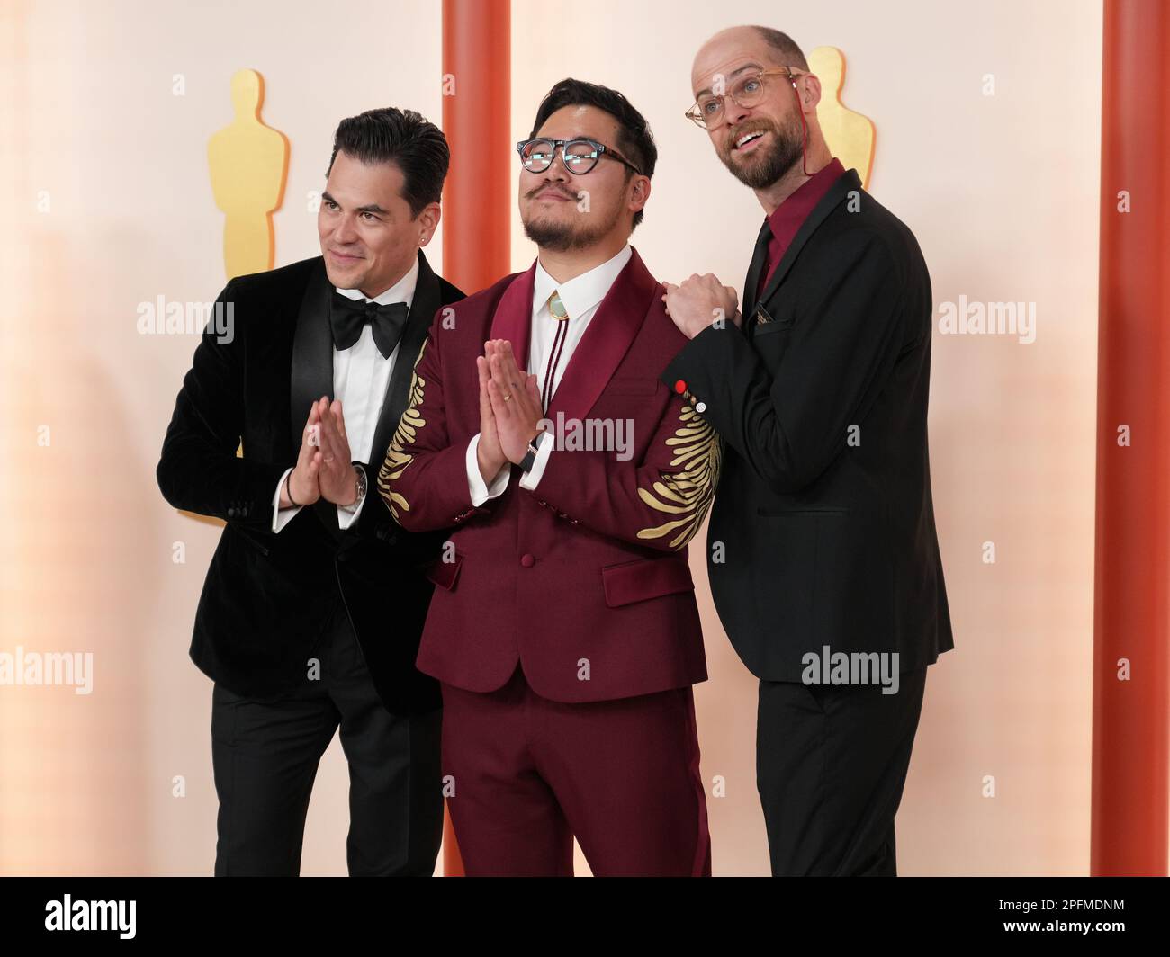 Jonathan Wang, Daniel Kwan and Daniel Scheinert walking on the red ...