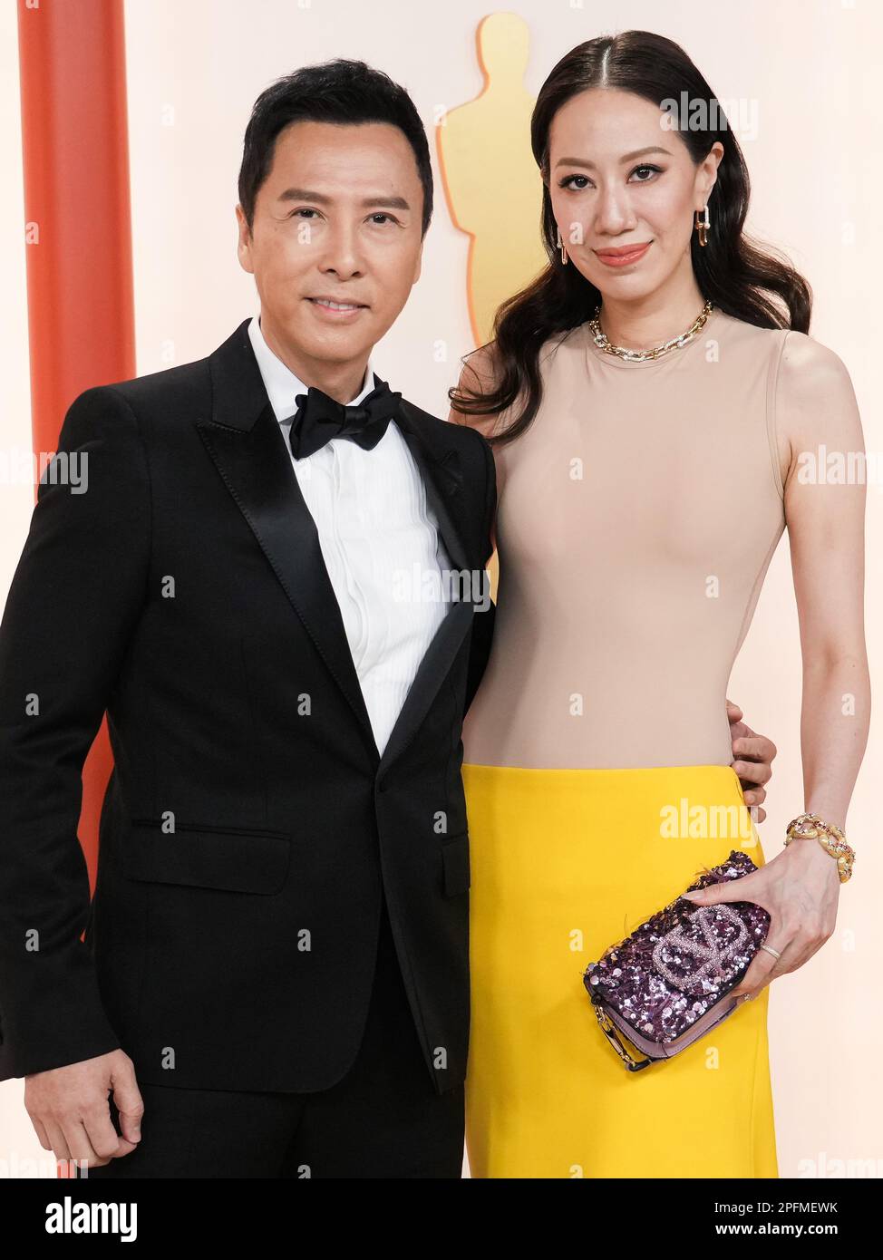 Los Angeles, USA. 12th Mar, 2023. Donnie Yen and Cissy Wang walking on the red carpet at the The ...