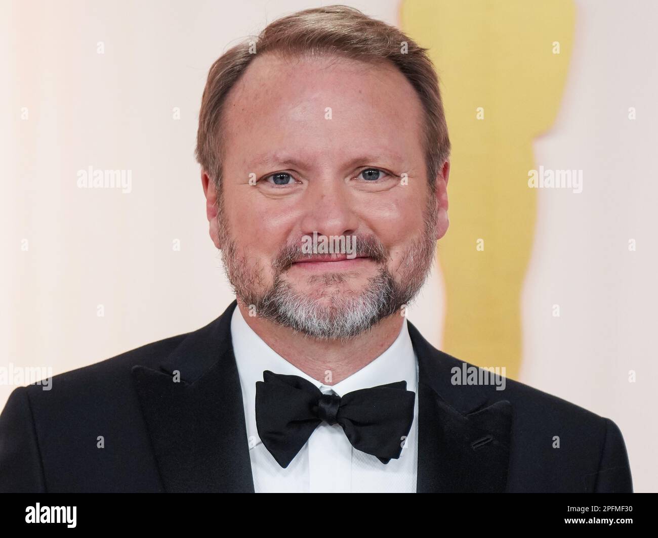 Rian Johnson walking on the red carpet at the The 95th Academy Awards ...