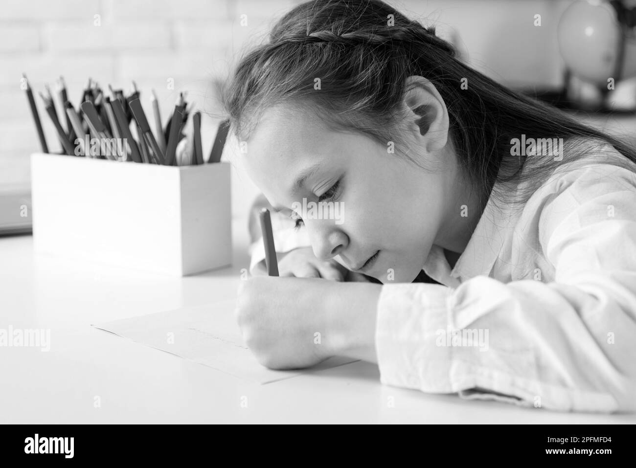 Happy cheerful child girl drawing. Creativity concept. Cute child ...