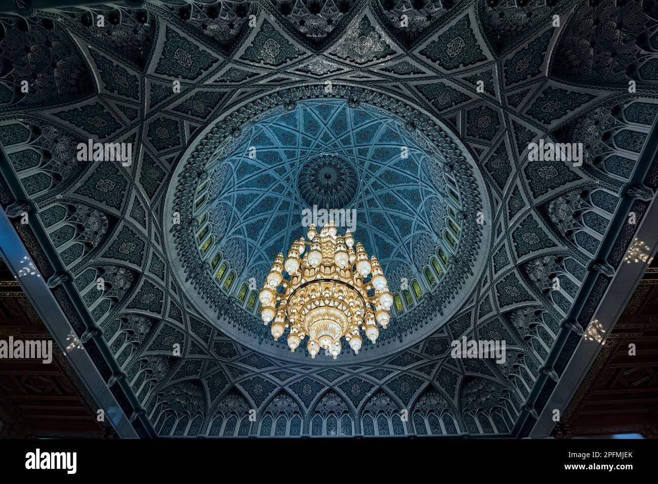 Bejeweled crystal and gold chandelier in the Sultan Qaboos Grand Mosque ...