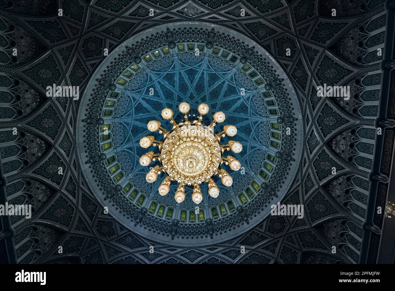 Bejeweled crystal and gold chandelier in the Sultan Qaboos Grand Mosque ...
