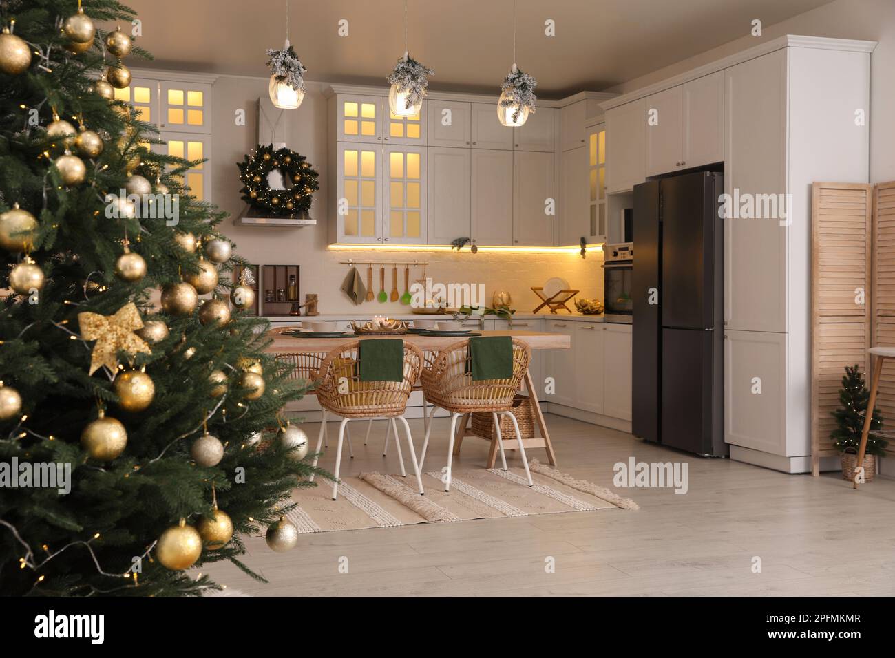 Cozy open plan kitchen decorated for Christmas. Interior design Stock ...