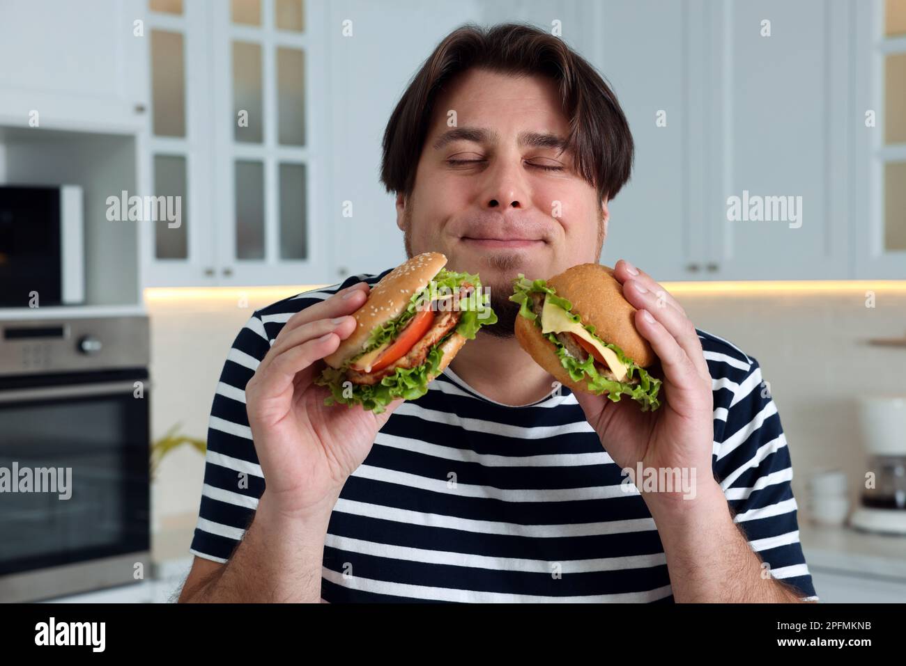 Happy overweight man hi-res stock photography and images - Alamy