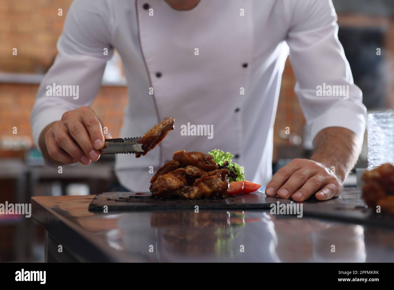 Making chicken wings hi-res stock photography and images - Alamy