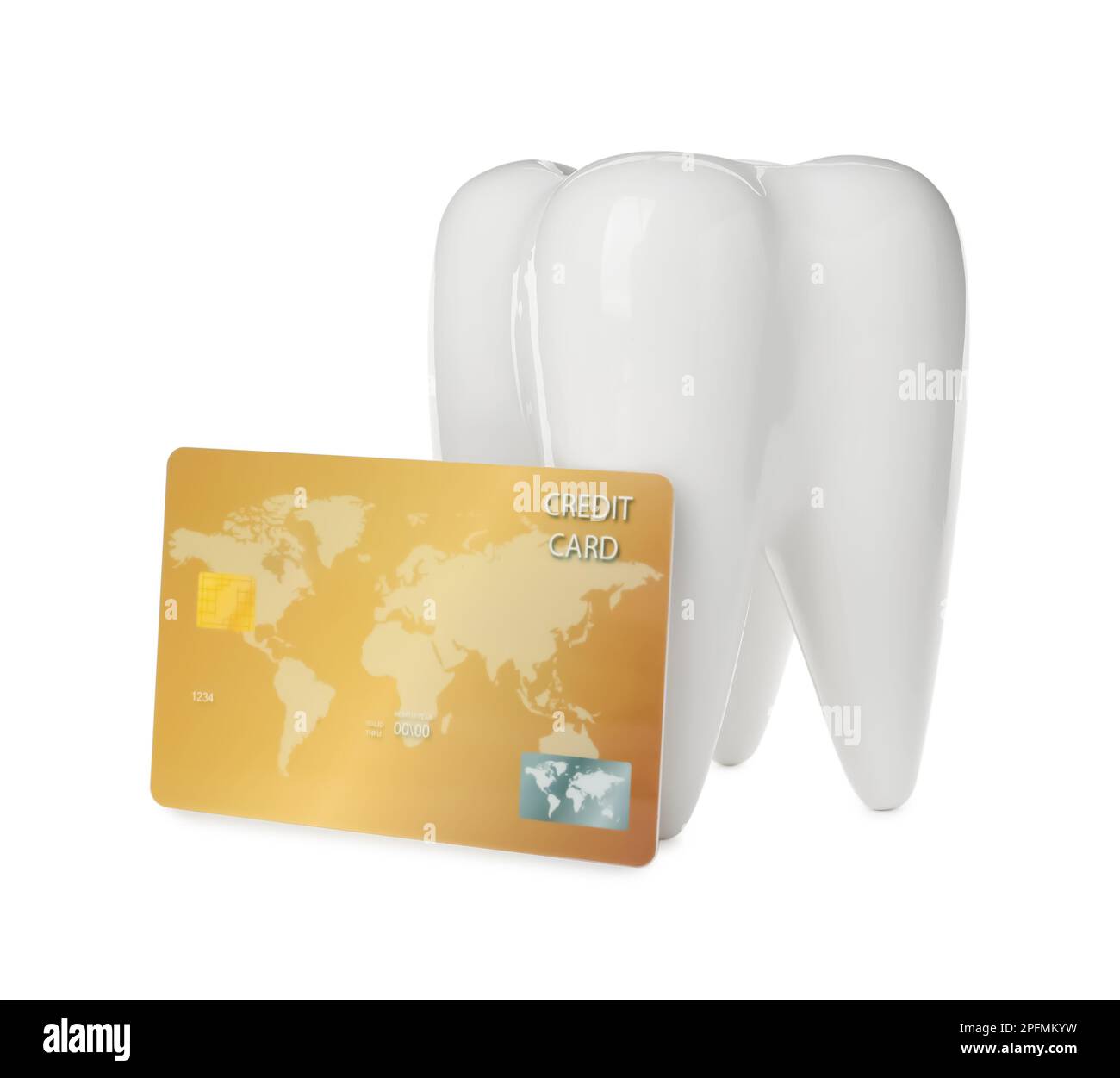 Ceramic model of tooth and credit card on white background. Expensive ...