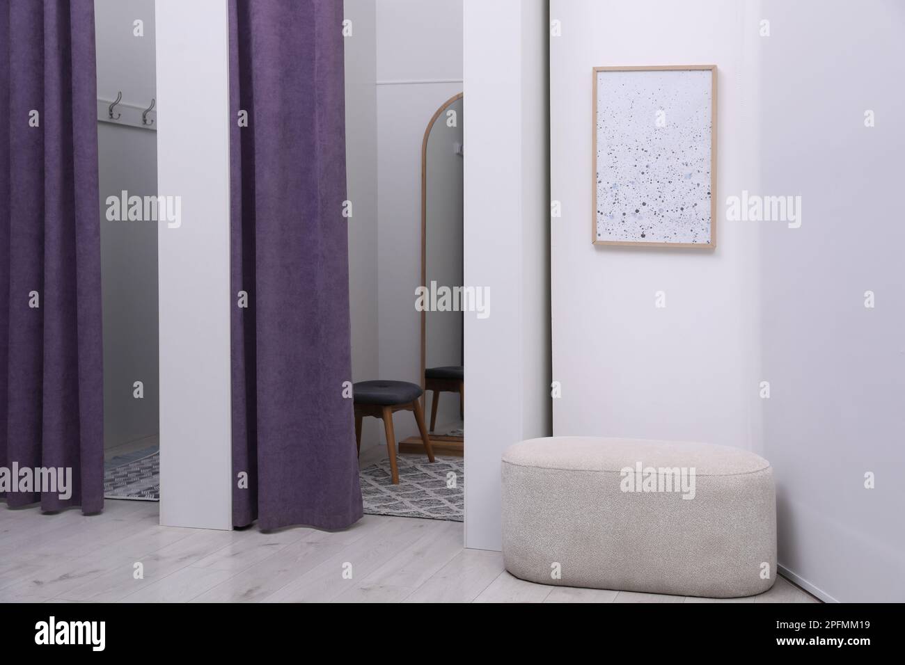 Empty dressing rooms in fashion store. Stylish interior Stock Photo - Alamy