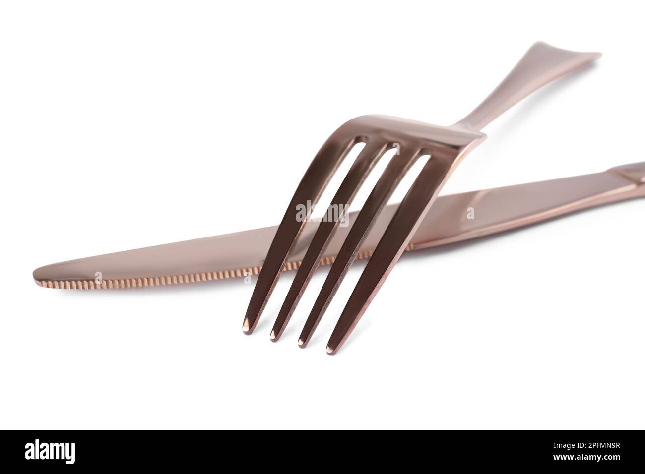 New shiny fork and knife on white background, closeup Stock Photo - Alamy