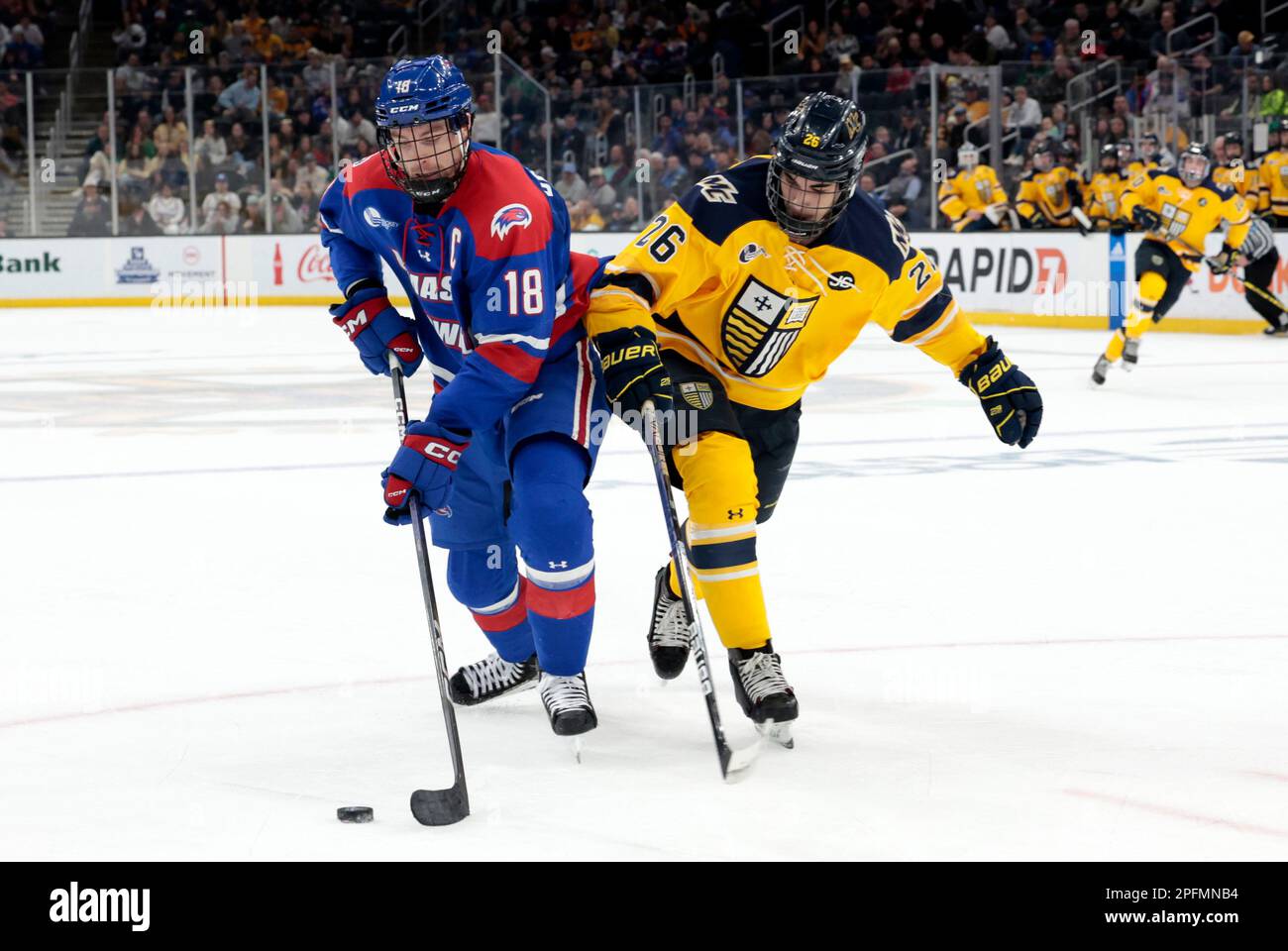 BOSTON, MA - MARCH 17: UMASS Lowell forward Carl Berglund (18) turns ...