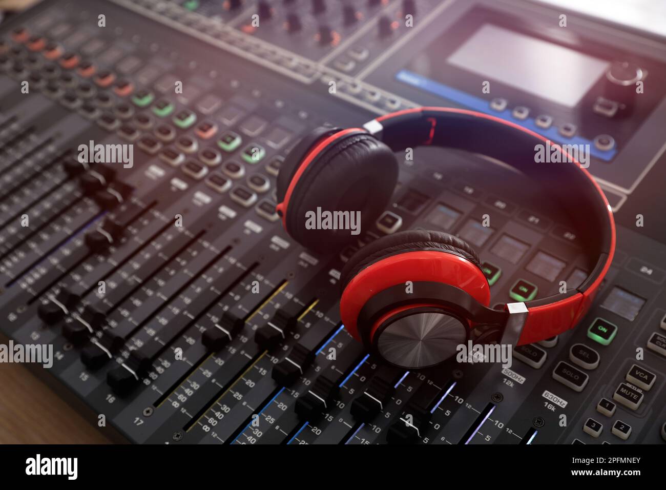 Headphones on professional mixing console in modern radio studio Stock ...