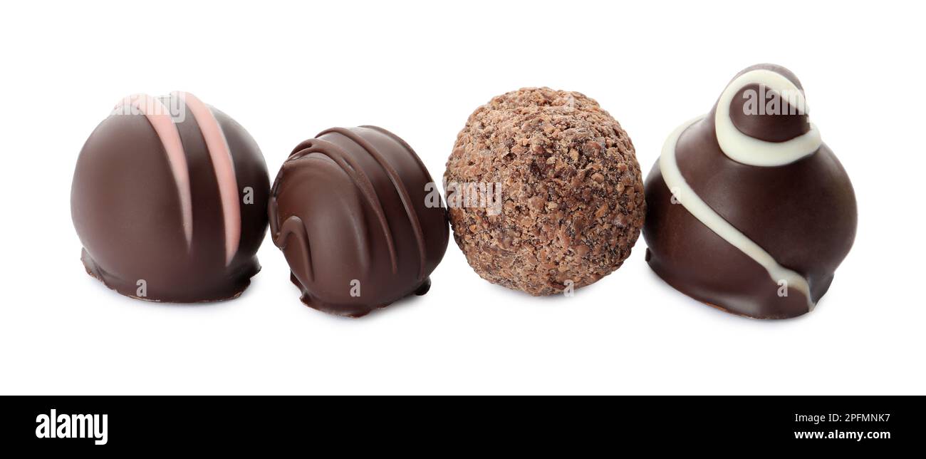 Many different delicious chocolate truffles on white background Stock ...