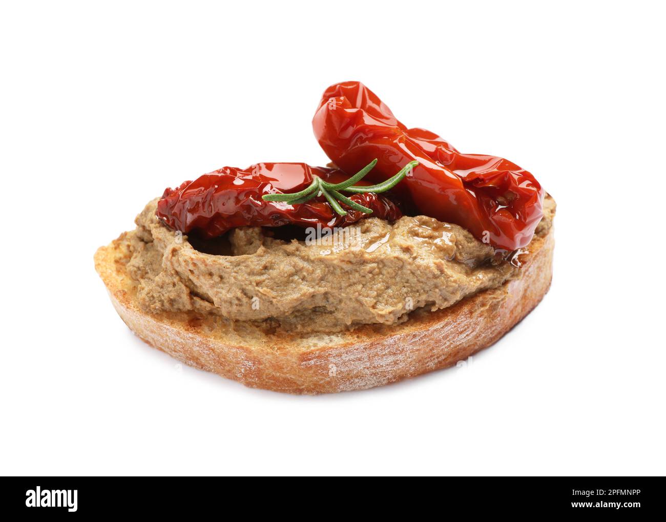 Slice of bread with delicious pate, sun dried tomatoes and rosemary ...
