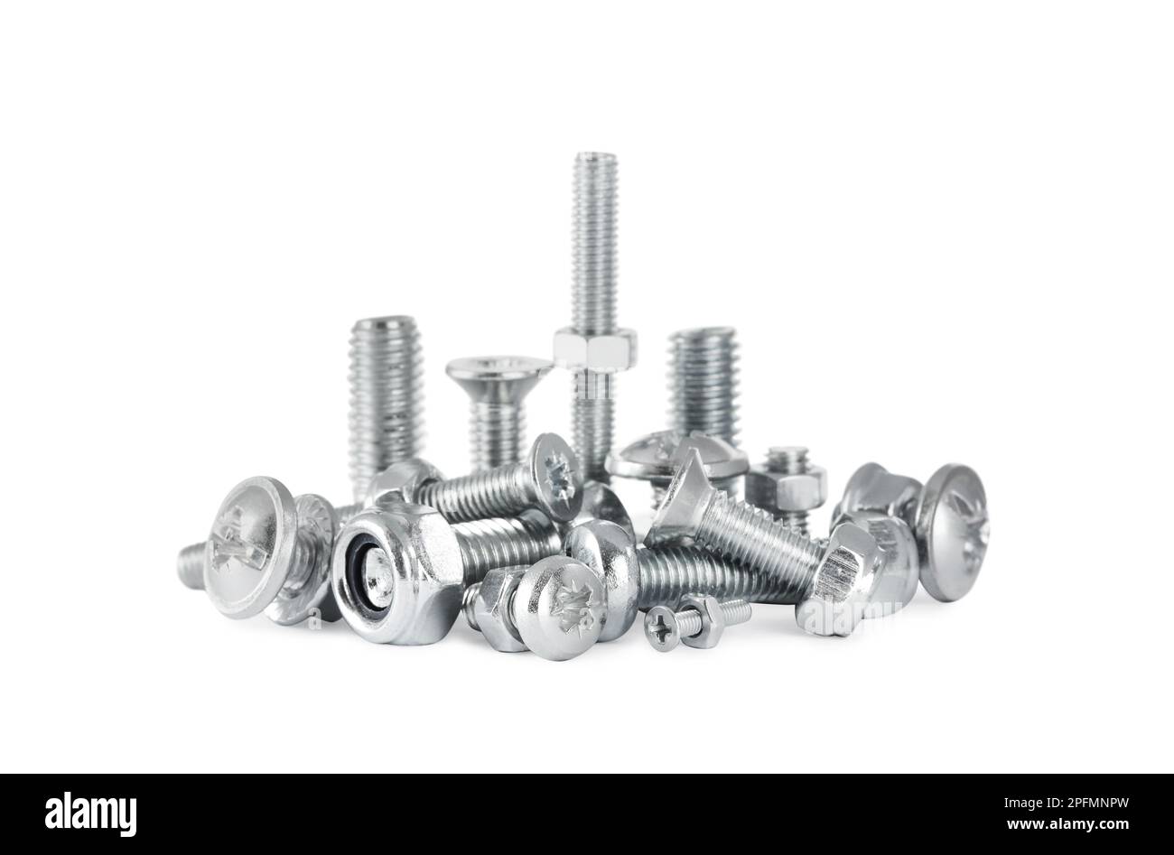 Different metal bolts and nuts on white background Stock Photo - Alamy