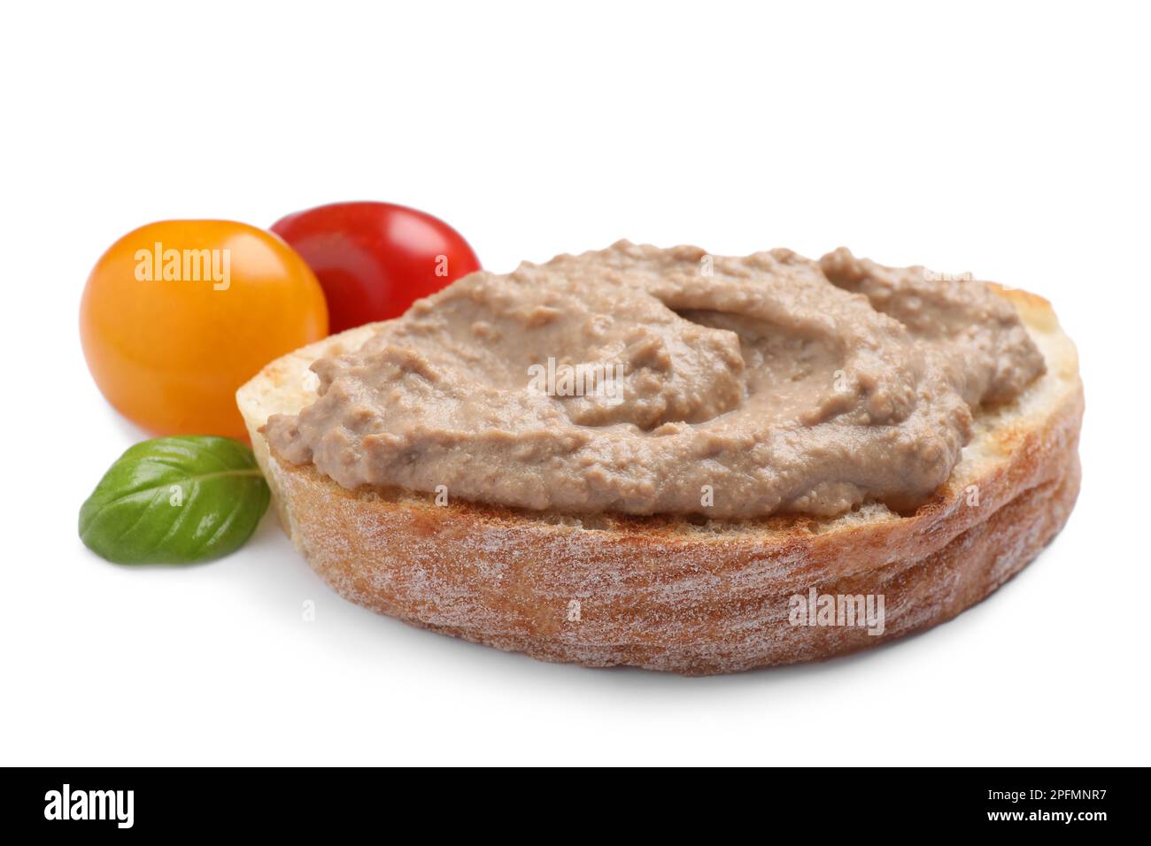 Slice of bread with delicious pate, tomatoes and basil on white ...