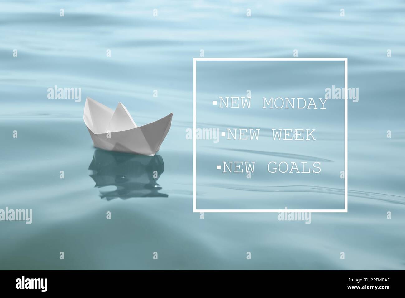New Monday, New Week, New Goals - motivational quote. White paper boat ...