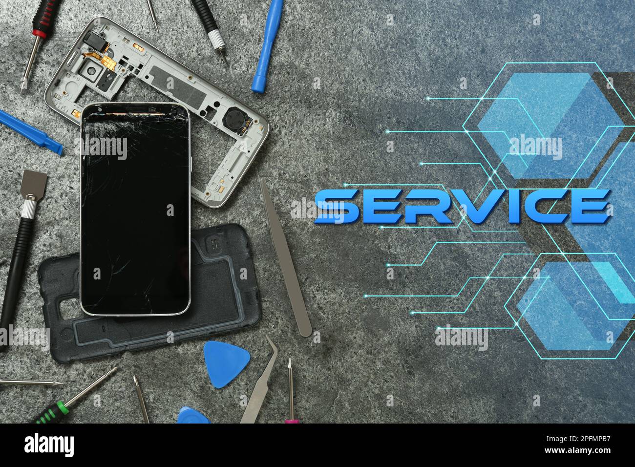 Parts of damaged smartphone and repair tool set on grey table, flat lay ...