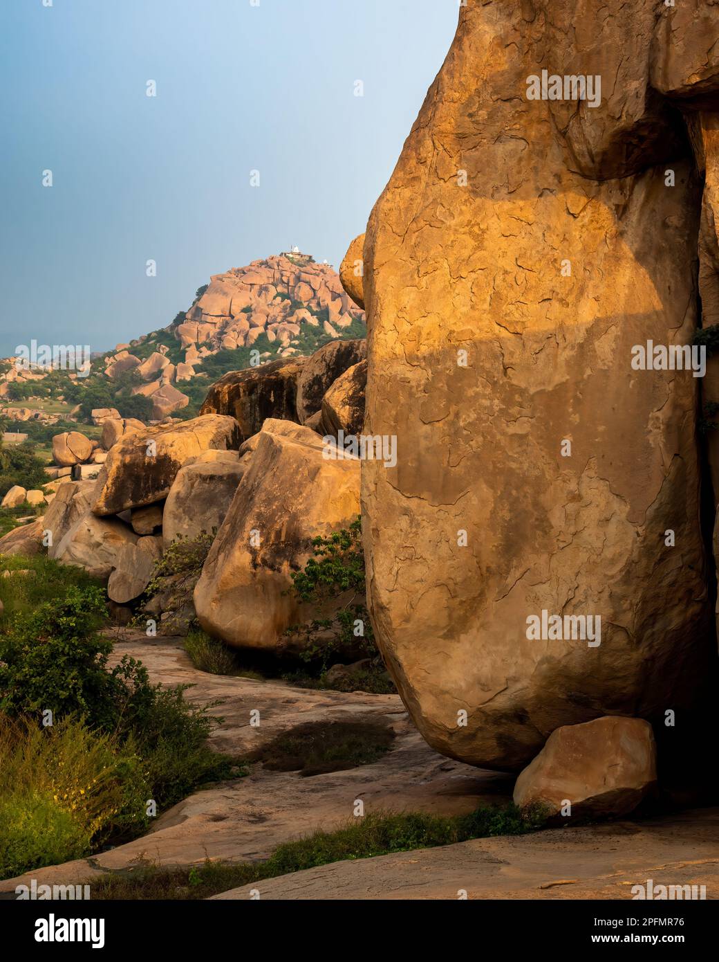 Beautiful view of boulder strewn landcape and ruins at Hampi. Hampi, the capital of Vijayanagar ...