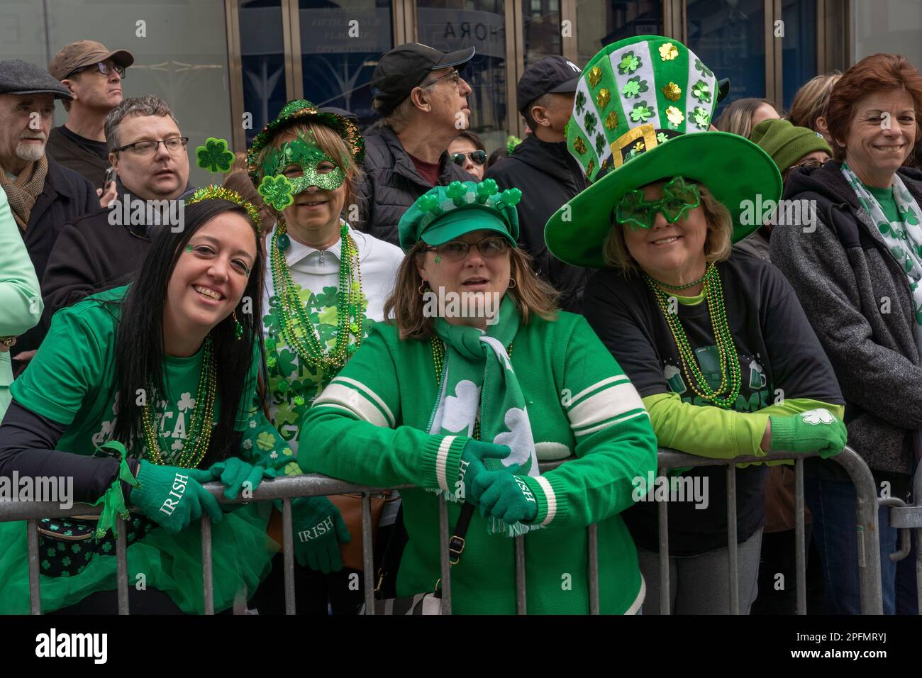 NEW YORK, NEW YORK - MARCH 17: Spectators watch and cheer during the St ...