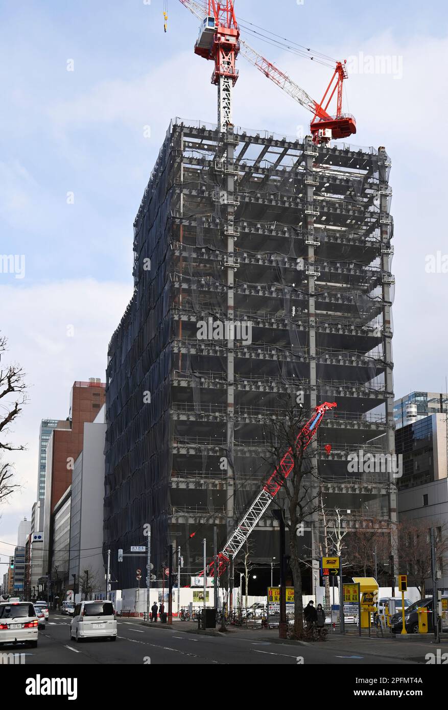 A photo shows a high-rise complex building under construction, where it ...