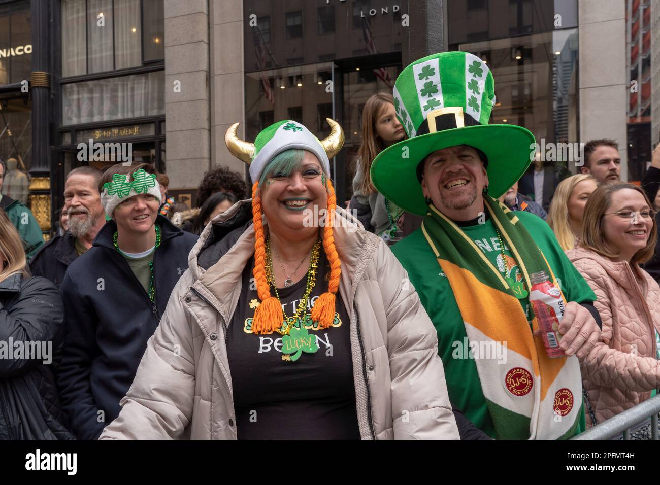 NEW YORK, NEW YORK - MARCH 17: Spectators watch and cheer during the St ...
