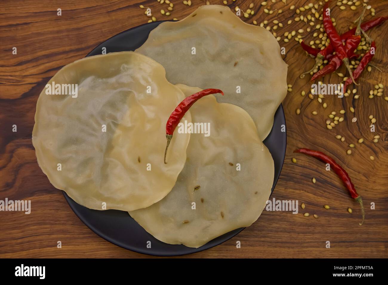 Papad, Khichiya papad, Rice papad, Chawal papad isolated on wooden ...