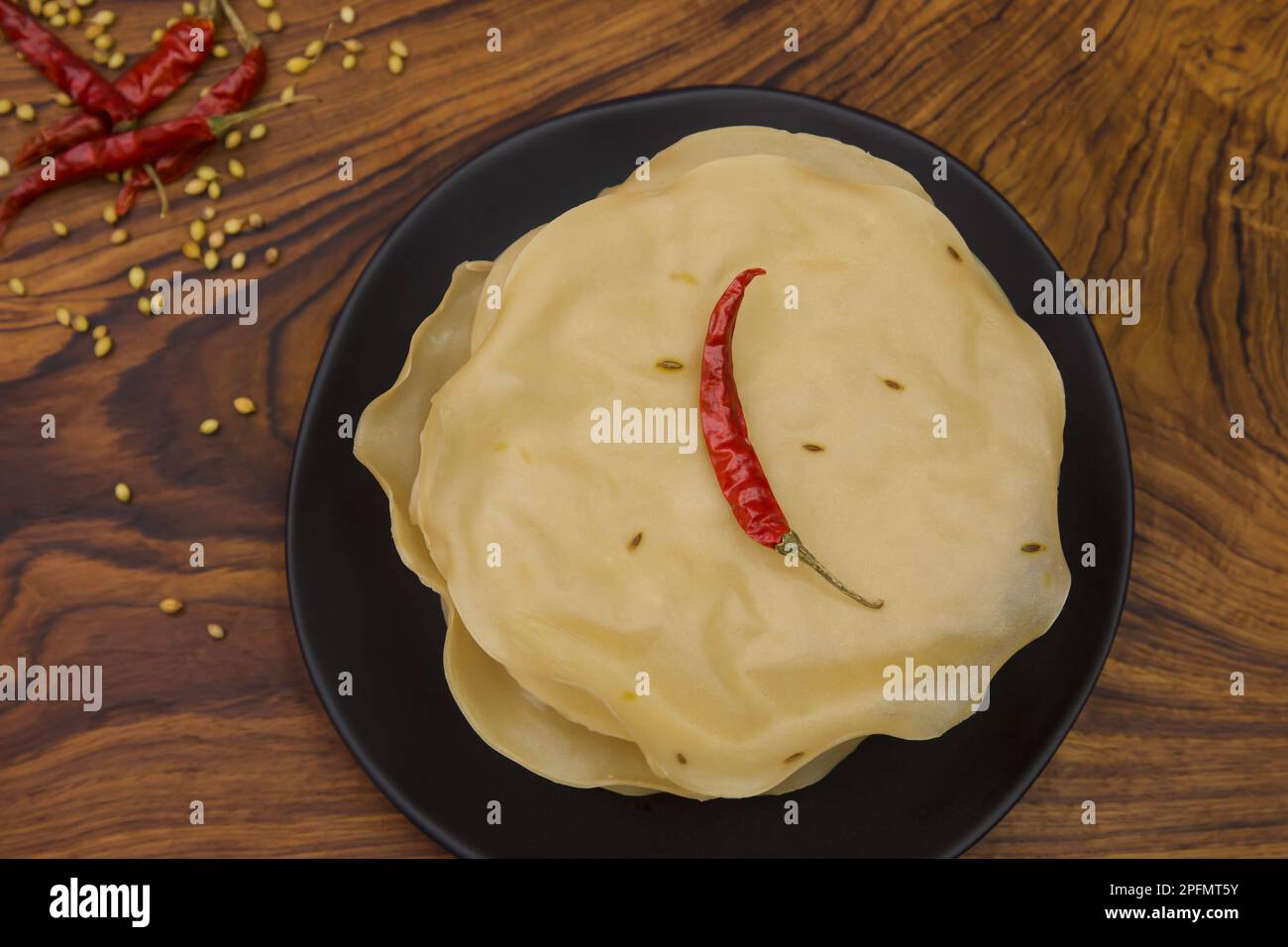 Papad, Khichiya papad, Rice papad, Chawal papad isolated on wooden ...
