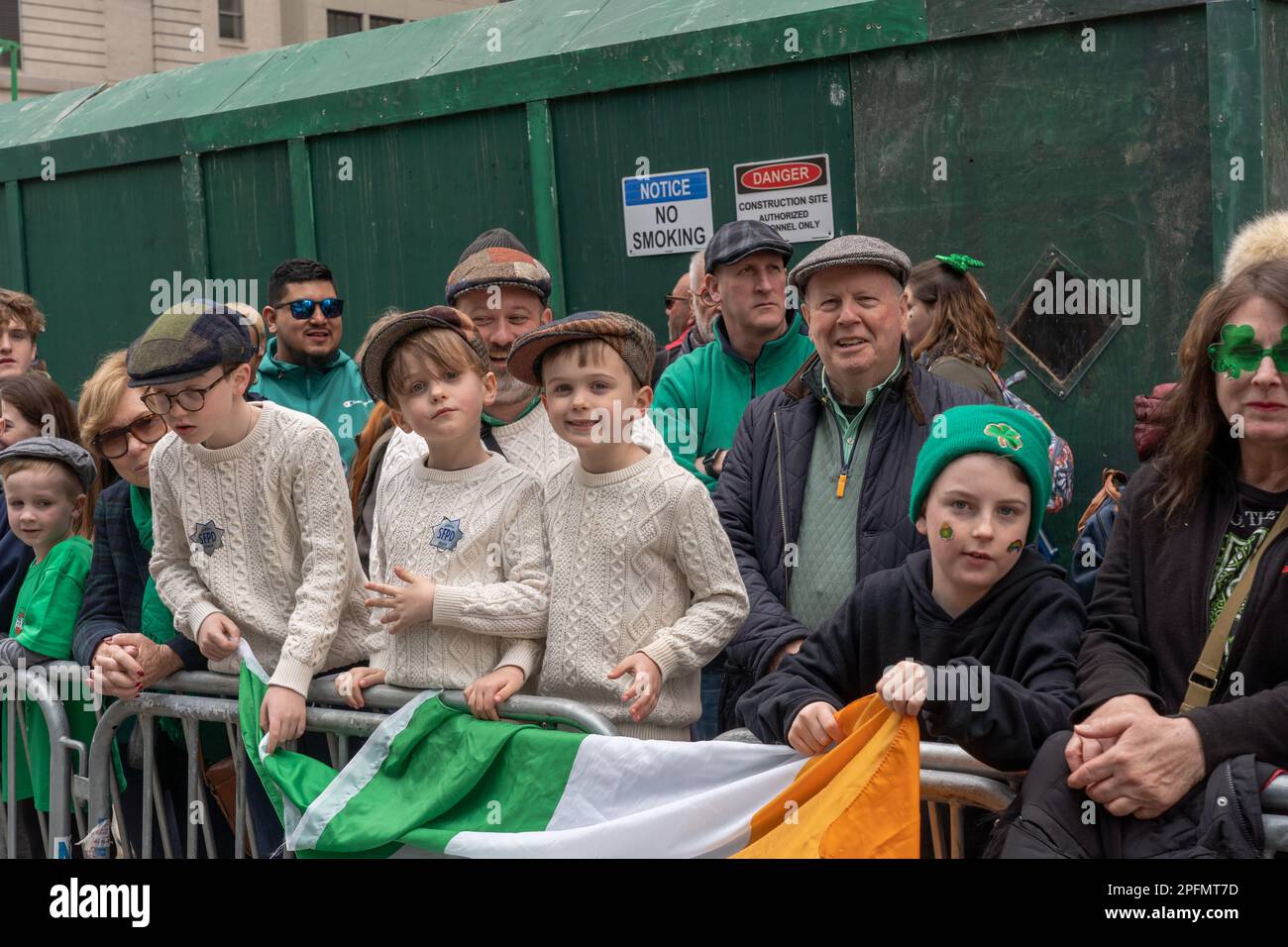 NEW YORK, NEW YORK - MARCH 17: Spectators watch and cheer during the St ...