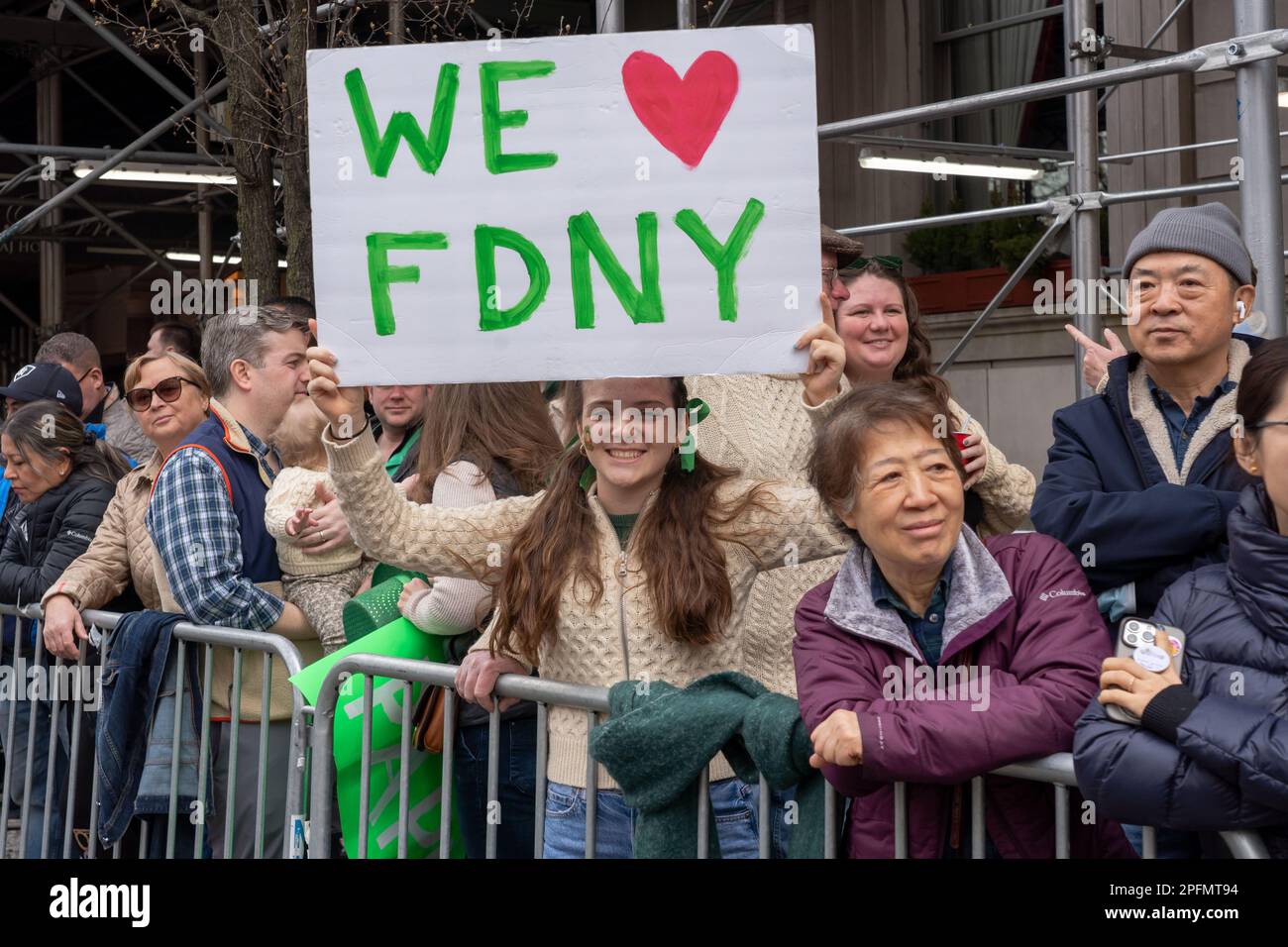 NEW YORK, NEW YORK - MARCH 17: A spectator holds a sign WE LOVE FDNY ...