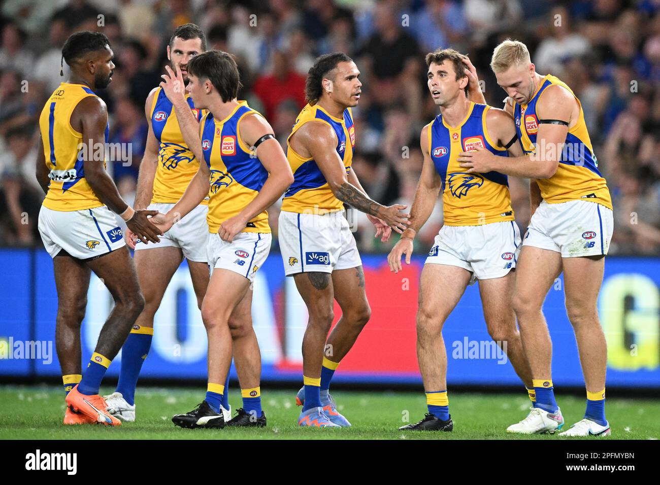 Jamie Cripps of West Coast (2nd right) celebrates with team mates after ...
