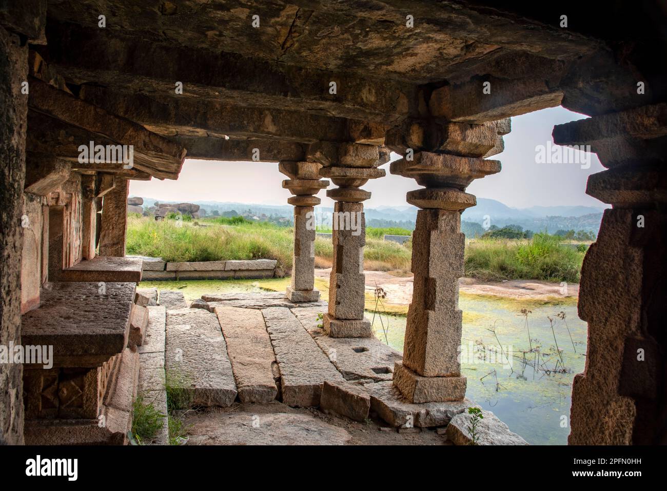Ruins on Hemakuta Hill in Hampi. Hampi, the capital of the Vijayanagar ...