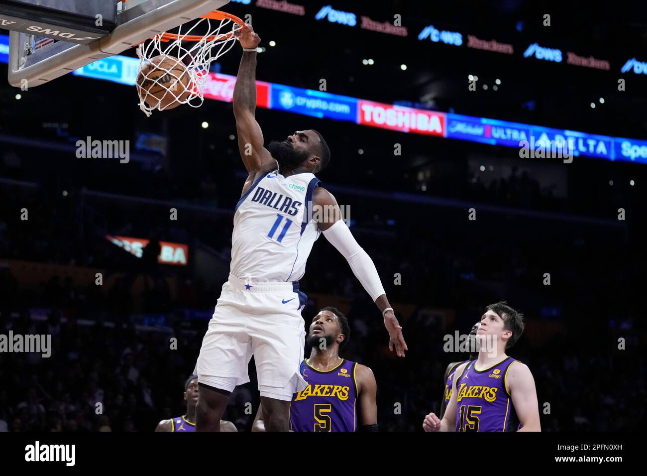 Dallas Mavericks forward Tim Hardaway Jr. (11) dunks past Los Angeles ...