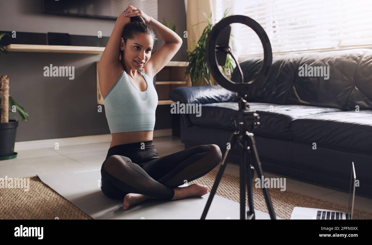 Today were work those muscles. a young female fitness trainer getting ...