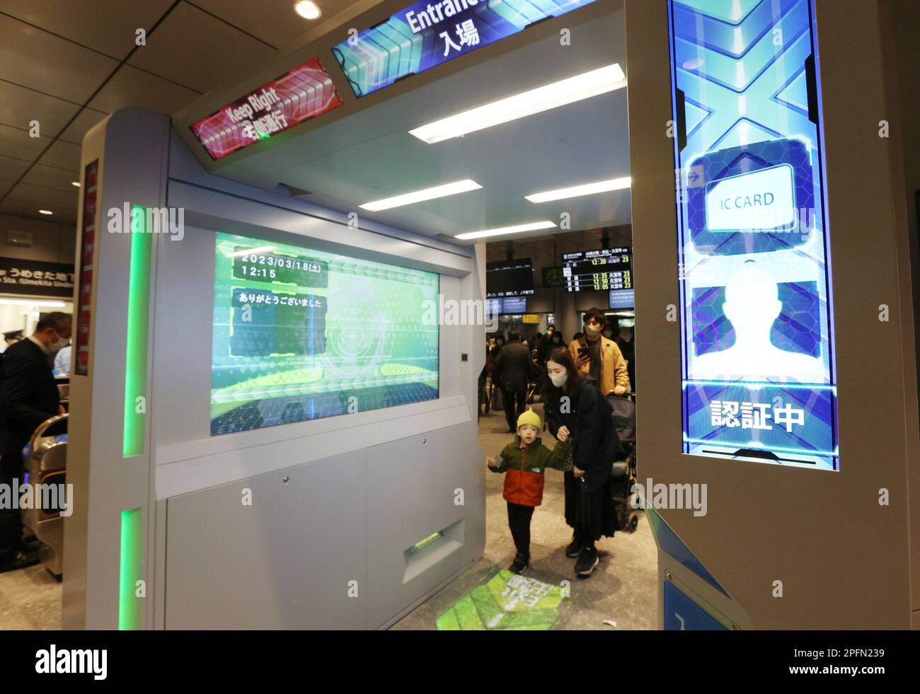 A facial recognition ticket gate is set at a newly opened platform at ...