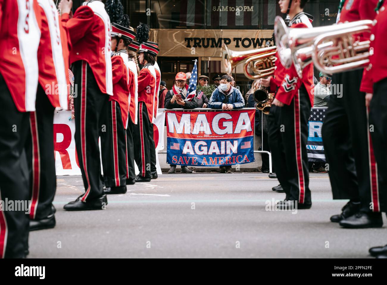 New York, United States. 17th Mar, 2023. A marching band walks past ...