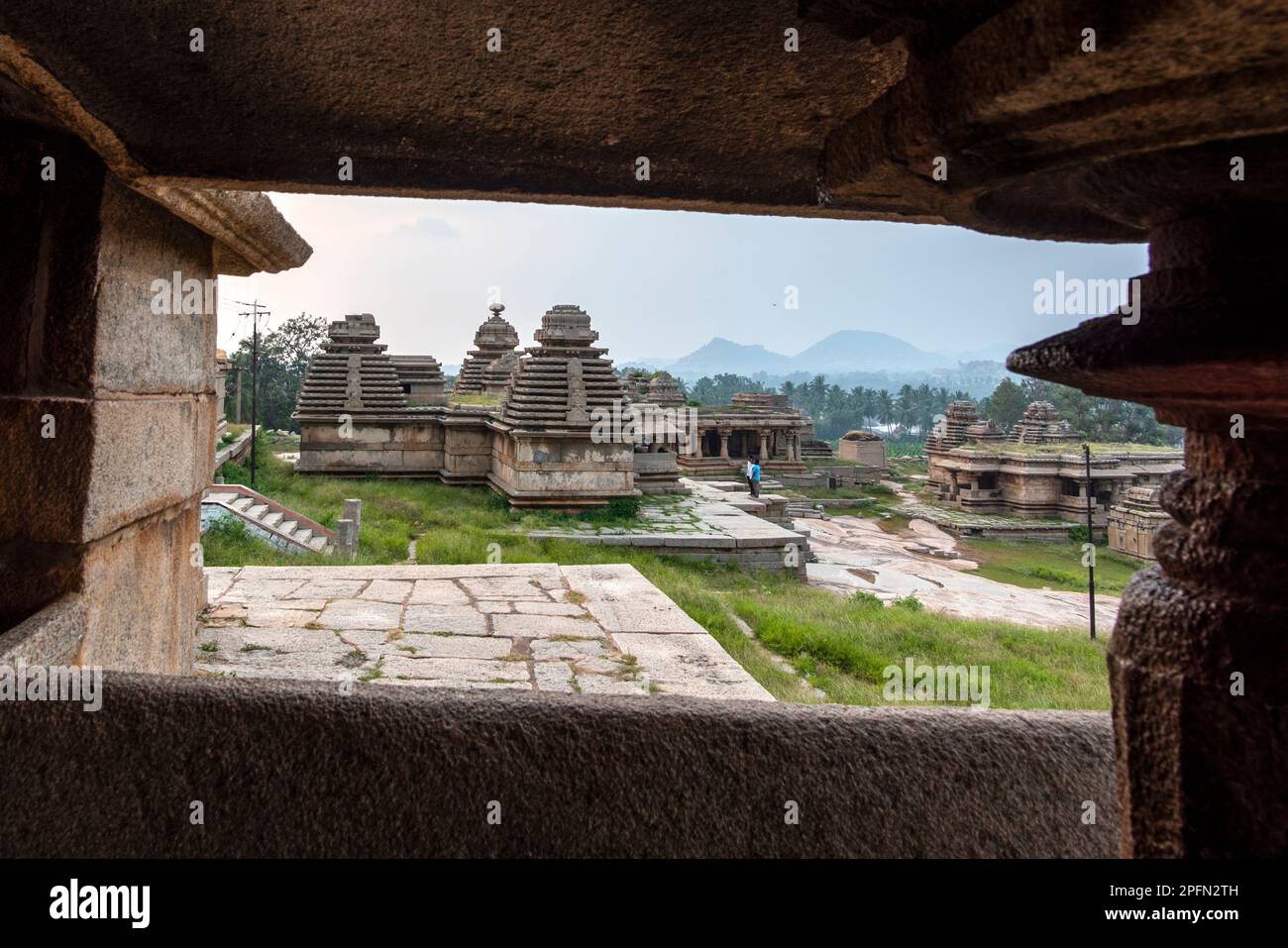Ruins on Hemakuta Hill in Hampi. Hampi, the capital of the Vijayanagar ...