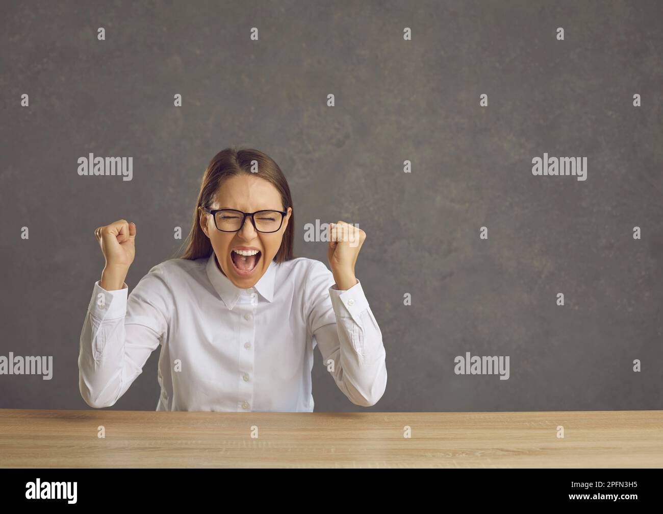 Excited young woman expressing shock hi-res stock photography and ...