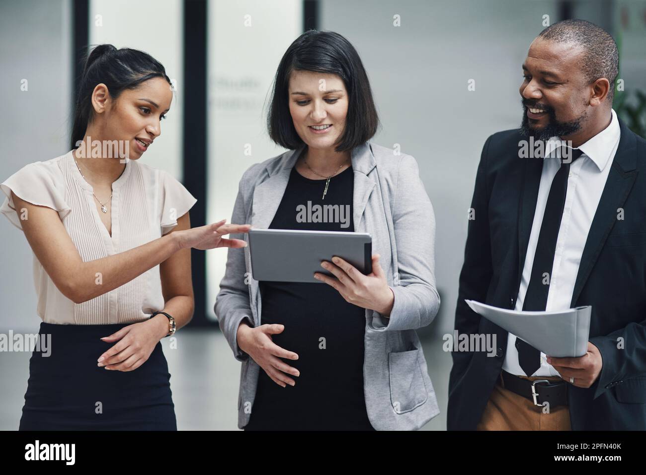 Hand it to this team to handle anything. a group of businesspeople ...