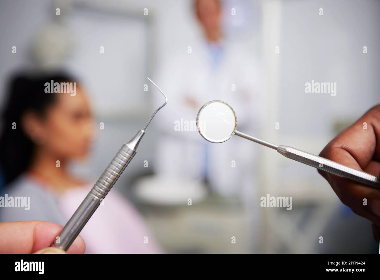 The countdown to zero cavities. an unrecognisable dentist holding ...