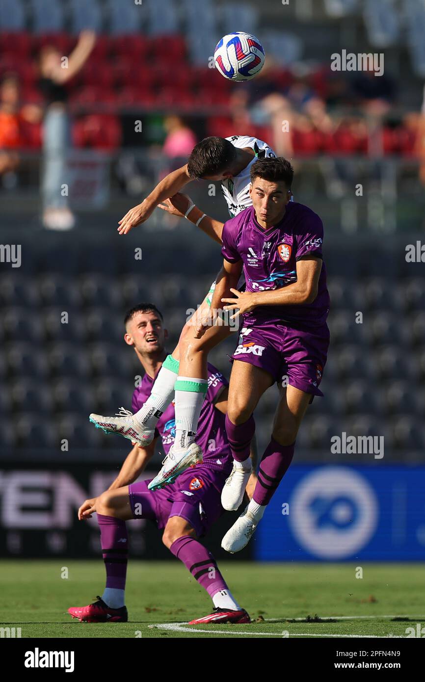 Rahmat Akbari of the Roar competes for a header during the A-League Men ...