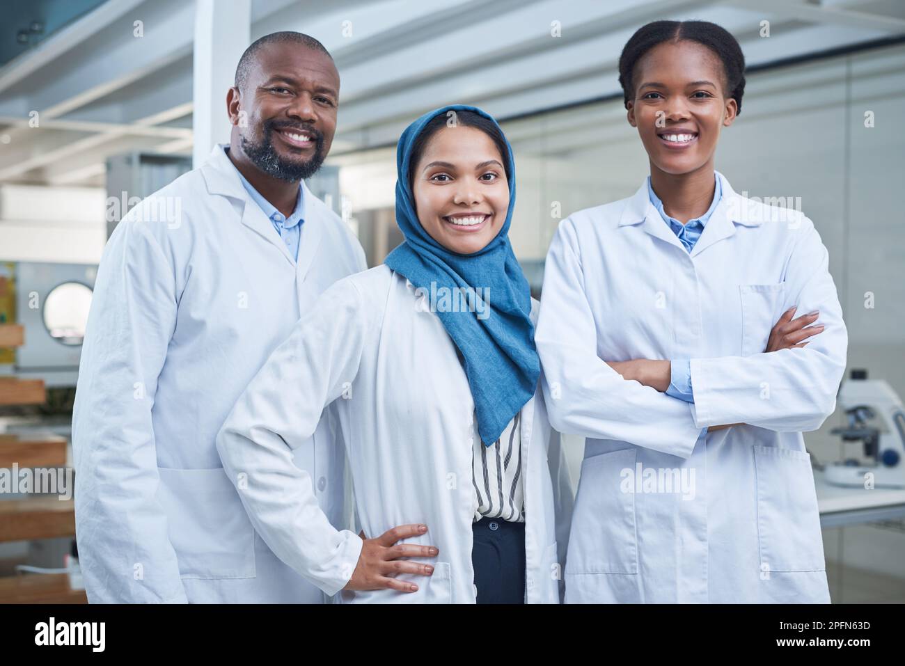 Confident team of scientists in the lab hi-res stock photography and ...